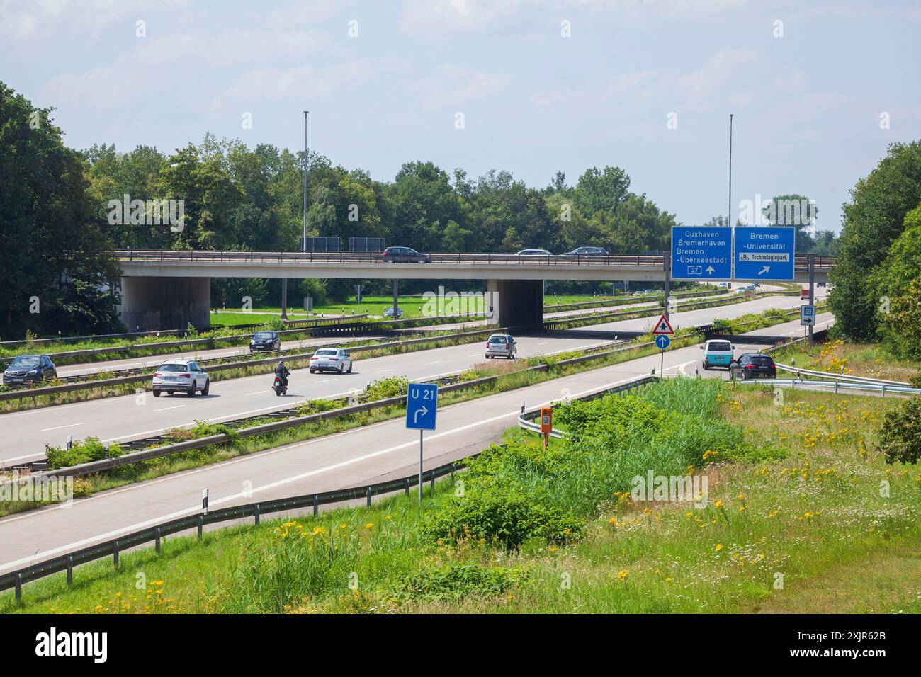 Motorway with road bridge and traffic signs, Bremen, Germany Stock ...