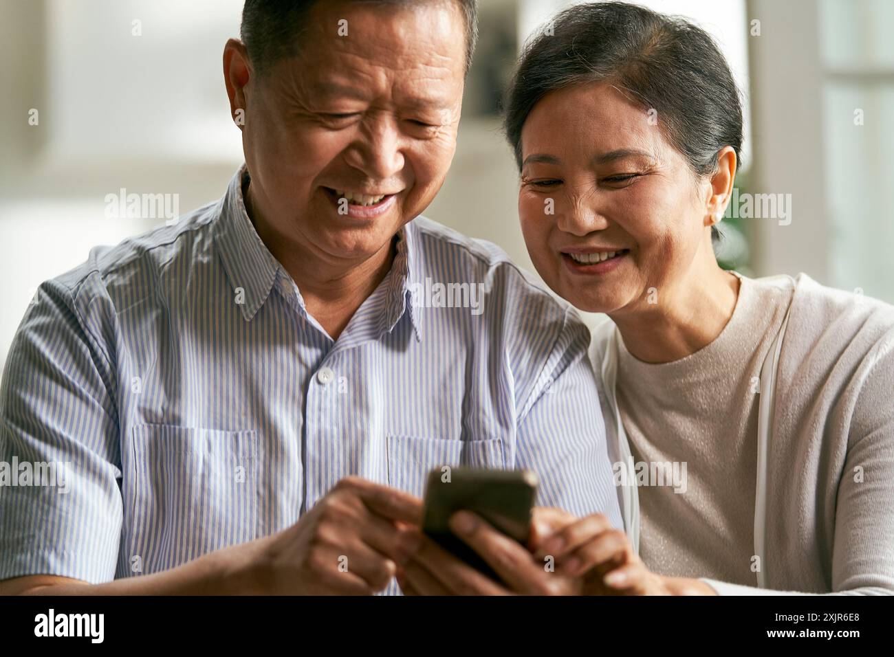 Elderly using smart home hi-res stock photography and images - Alamy