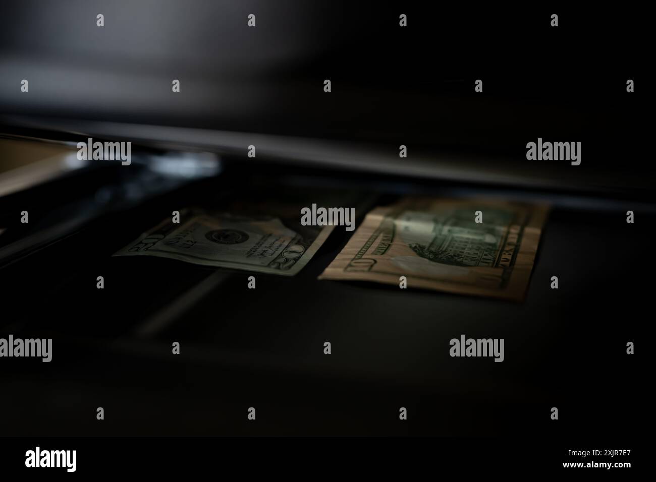 Using a copy machine to print forgery currency Stock Photo - Alamy