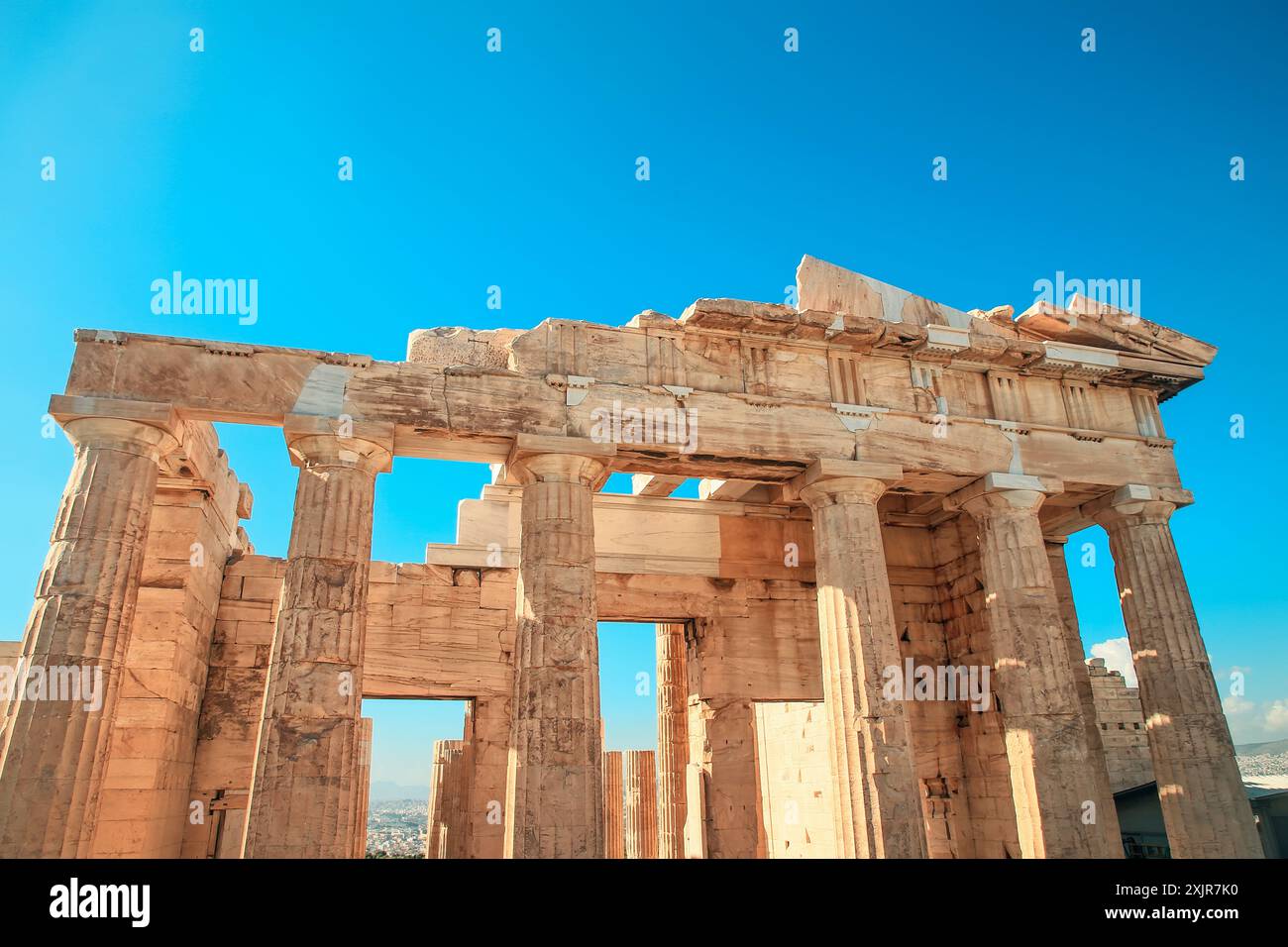 Looking up at a columns of Propylaea gateway in Acropolis of Athens, Greece Stock Photo - Alamy