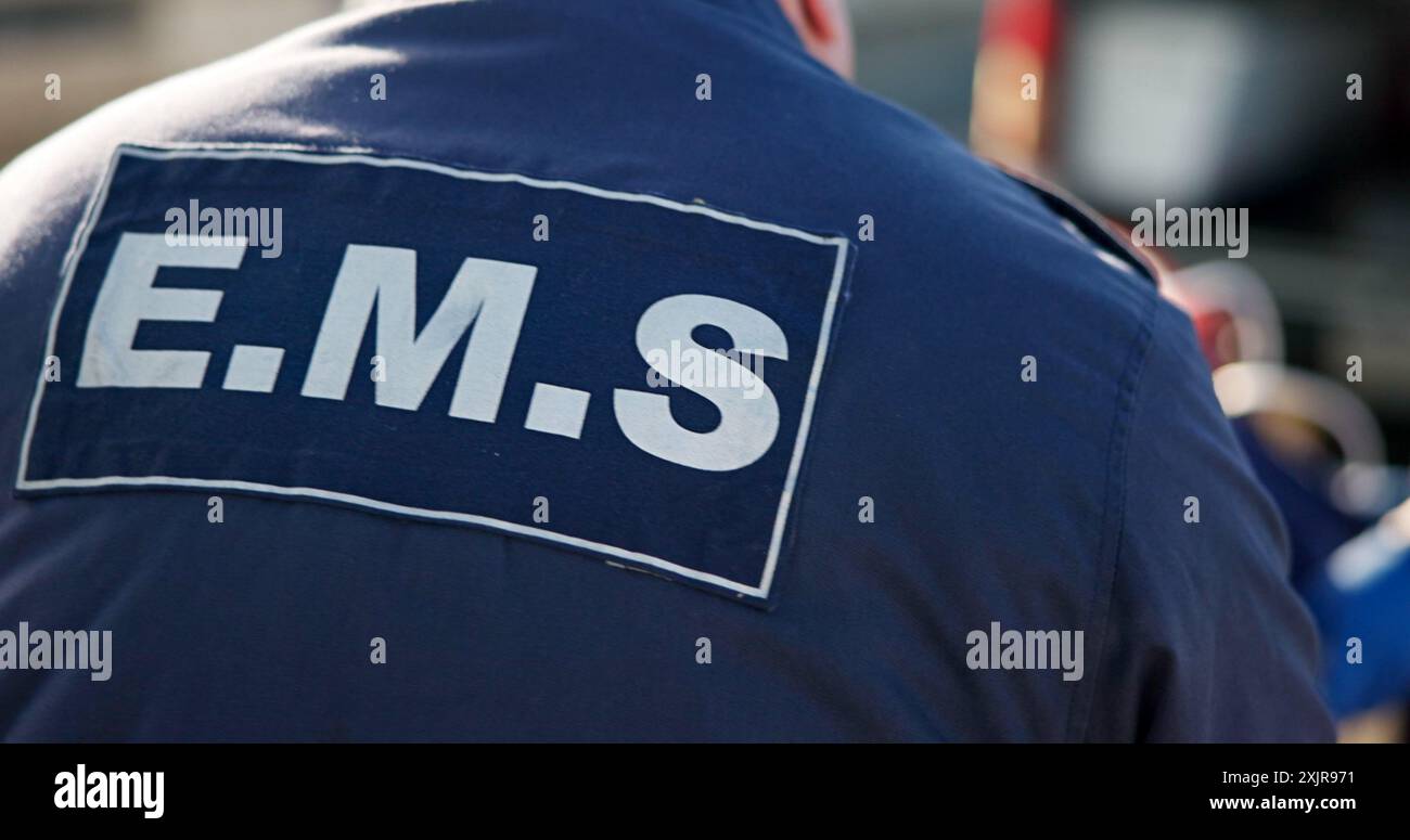 EMS, medical emergency and first responder at accident with first aid ...