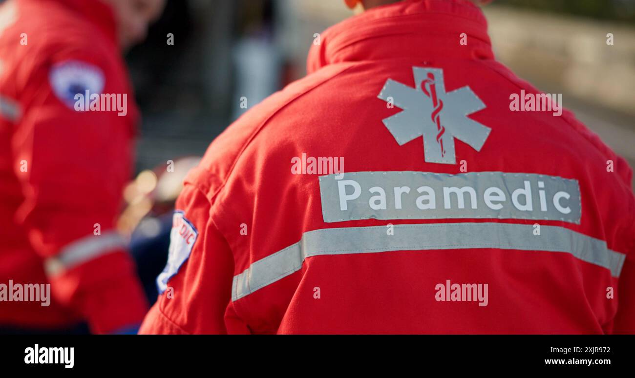 Paramedic, medical emergency and people by accident with first aid for ...