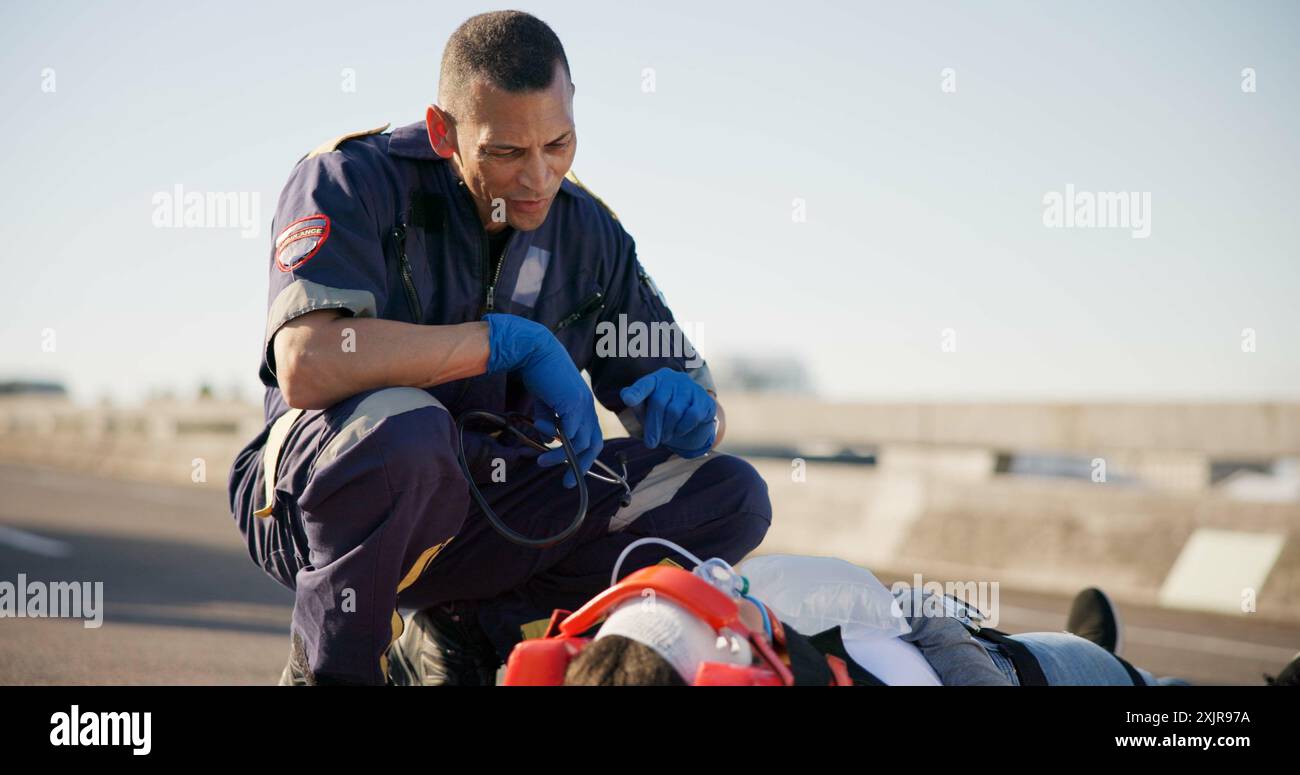 Paramedic, emergency and talking on road from car crash accident with ...