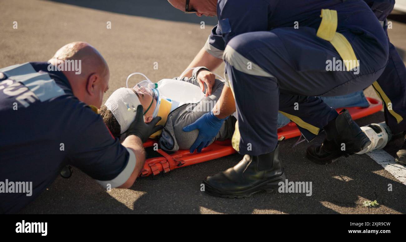 Paramedic, emergency and injury check on road from car crash accident ...