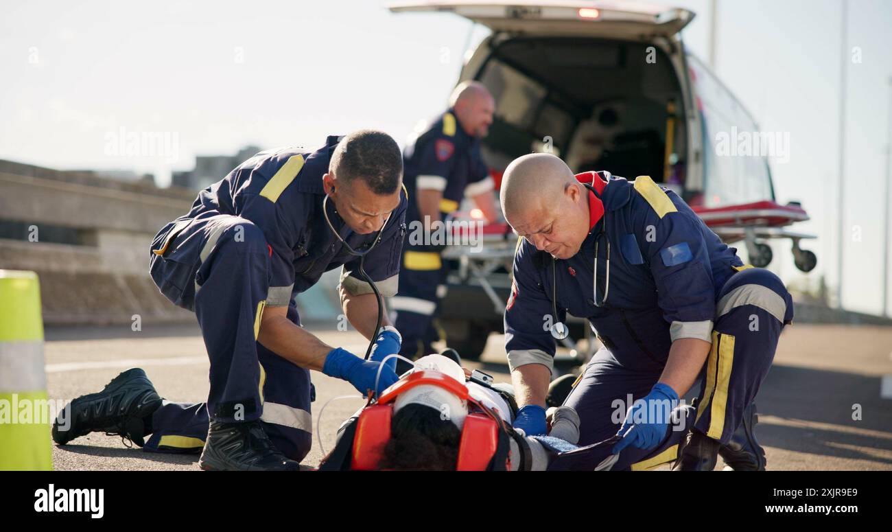 Paramedic, emergency and ambulance on road from car crash accident with ...