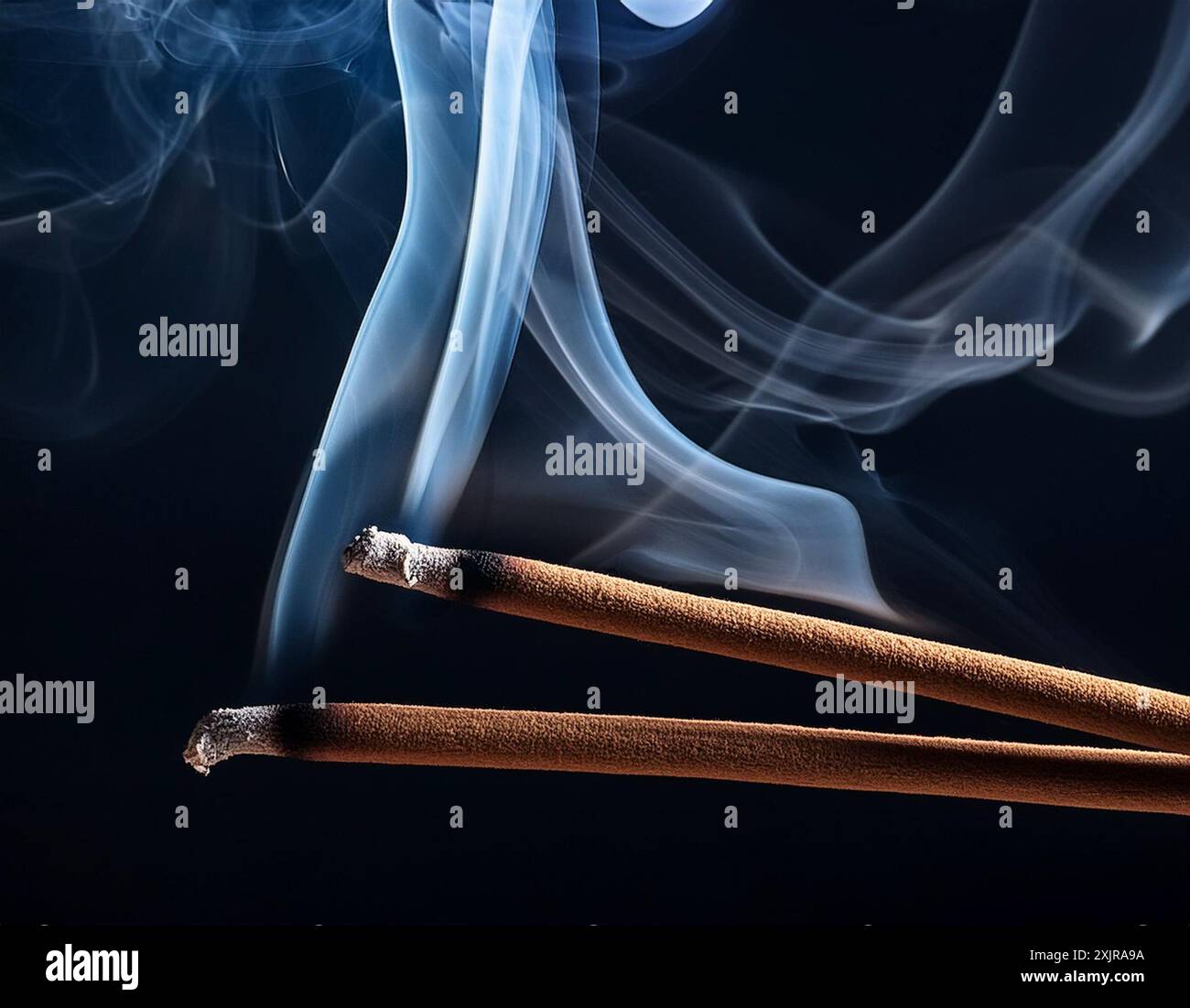 Incense Stick Burning with Smoke Rising in Delicate Patterns for a ...