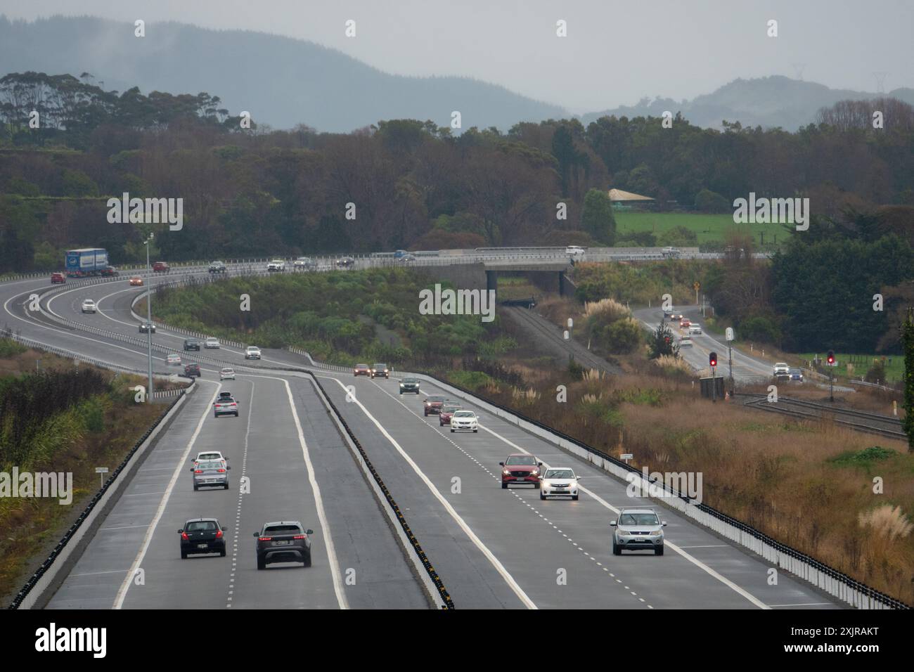 Traffic driving in rain on Peka Peka to Otaki expressway in Kapiti, New ...