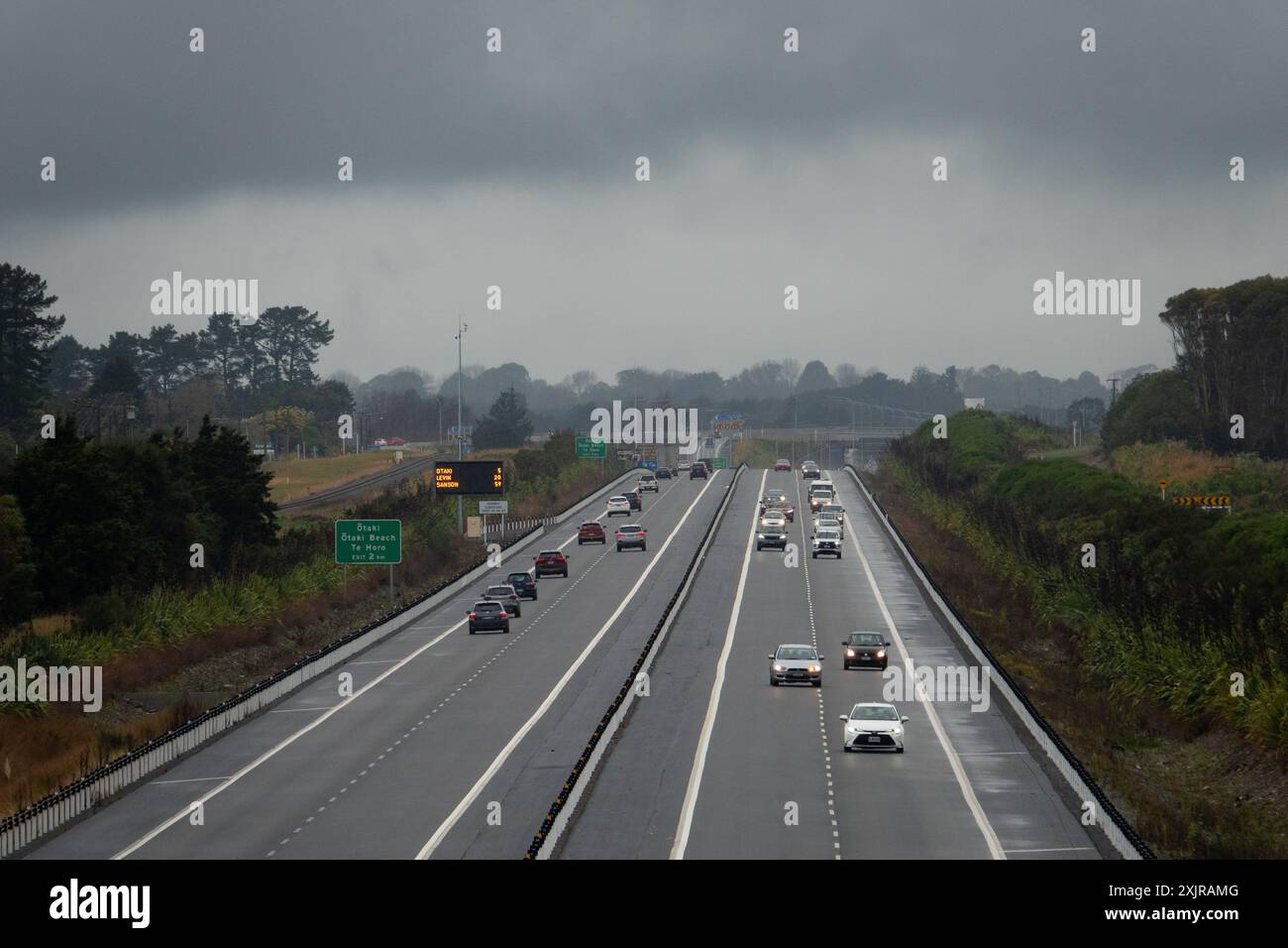 Traffic driving in rain on Peka Peka to Otaki expressway in Kapiti, New ...