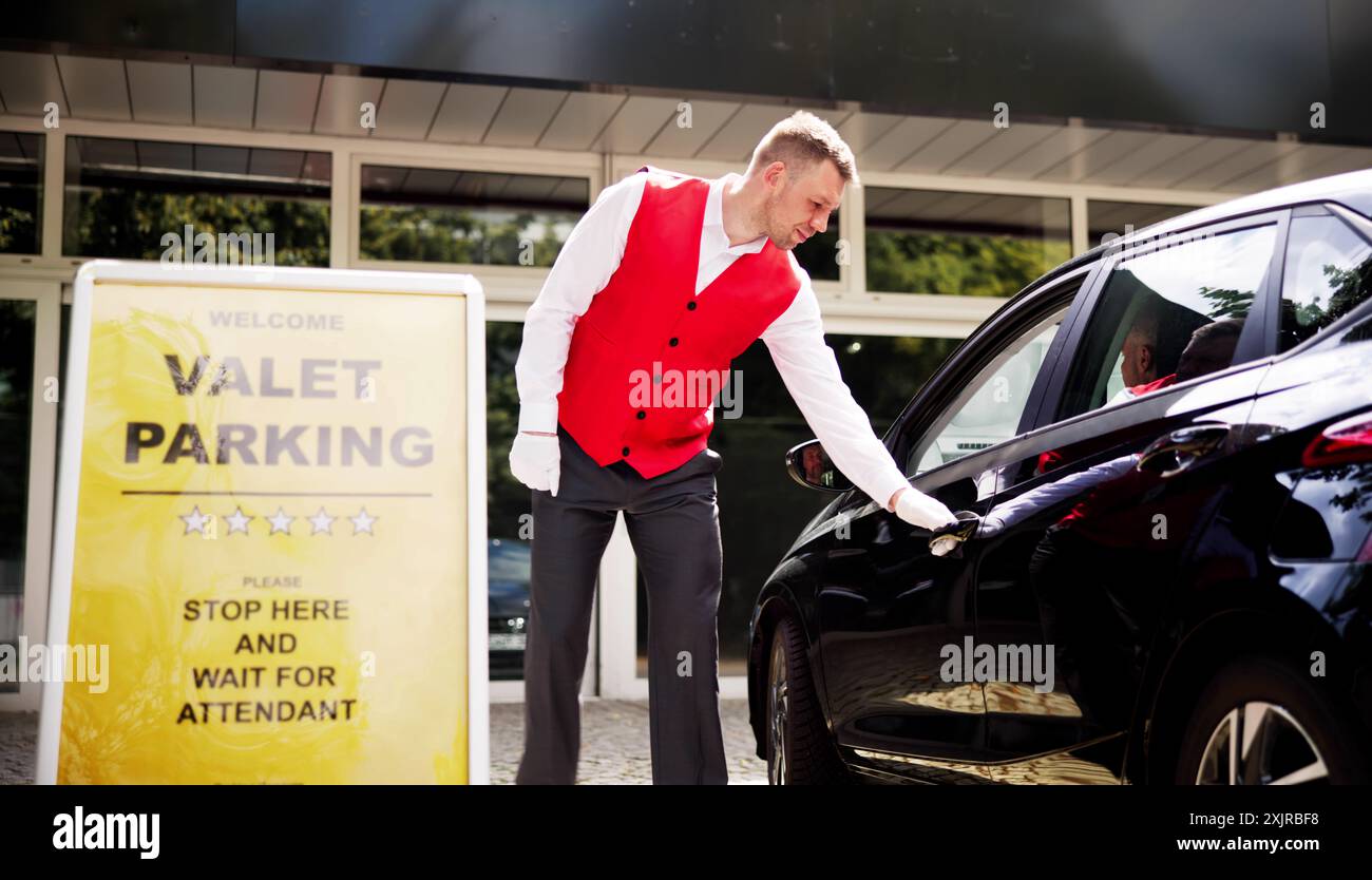 Young man receives assistance from hi-res stock photography and images ...