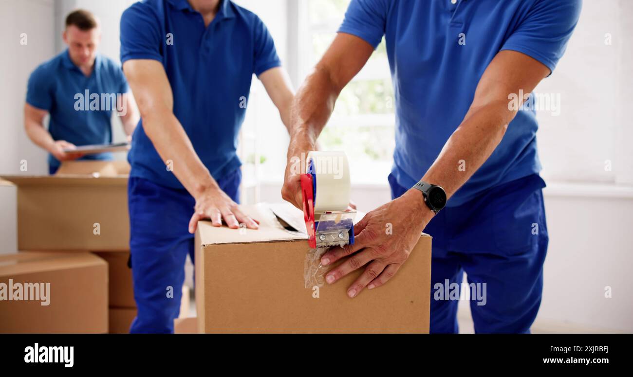 Skilled Logistics Specialist Wrapping Furniture for Residential ...