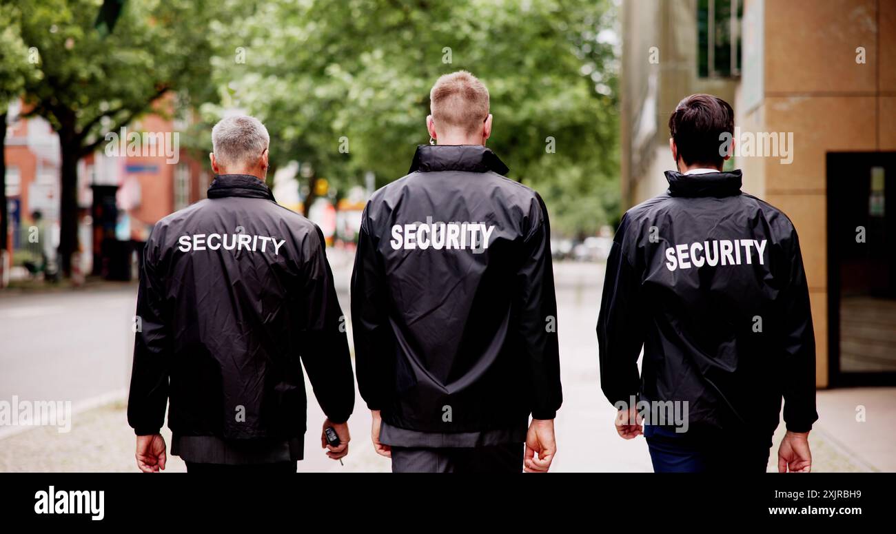 Security Guard Event Service: Officer Leading Group on Patrol ...