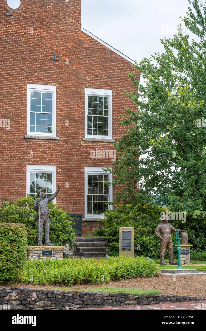 Statues of The Discovery (left), depicting a gold miner, and The Potter ...