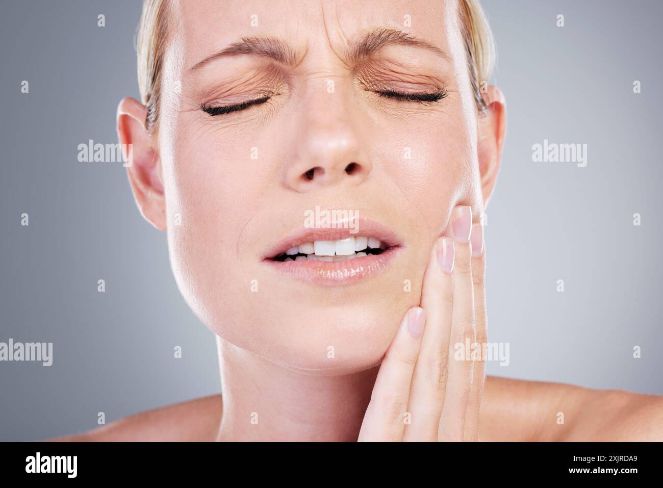 Medical, dental and woman in studio with toothache, inflammation and ...