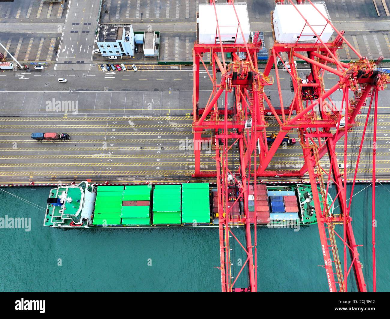 LIANYUNGANG, CHINA - JULY 20, 2024 - Cargo ships stop at their berths ...