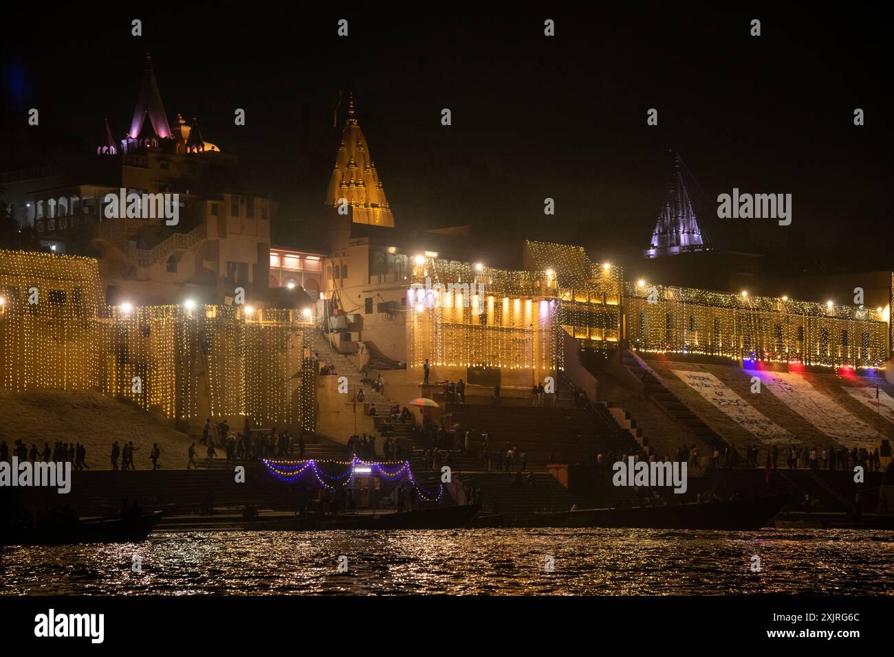 Varanasi ghat night light reflection hi-res stock photography and ...
