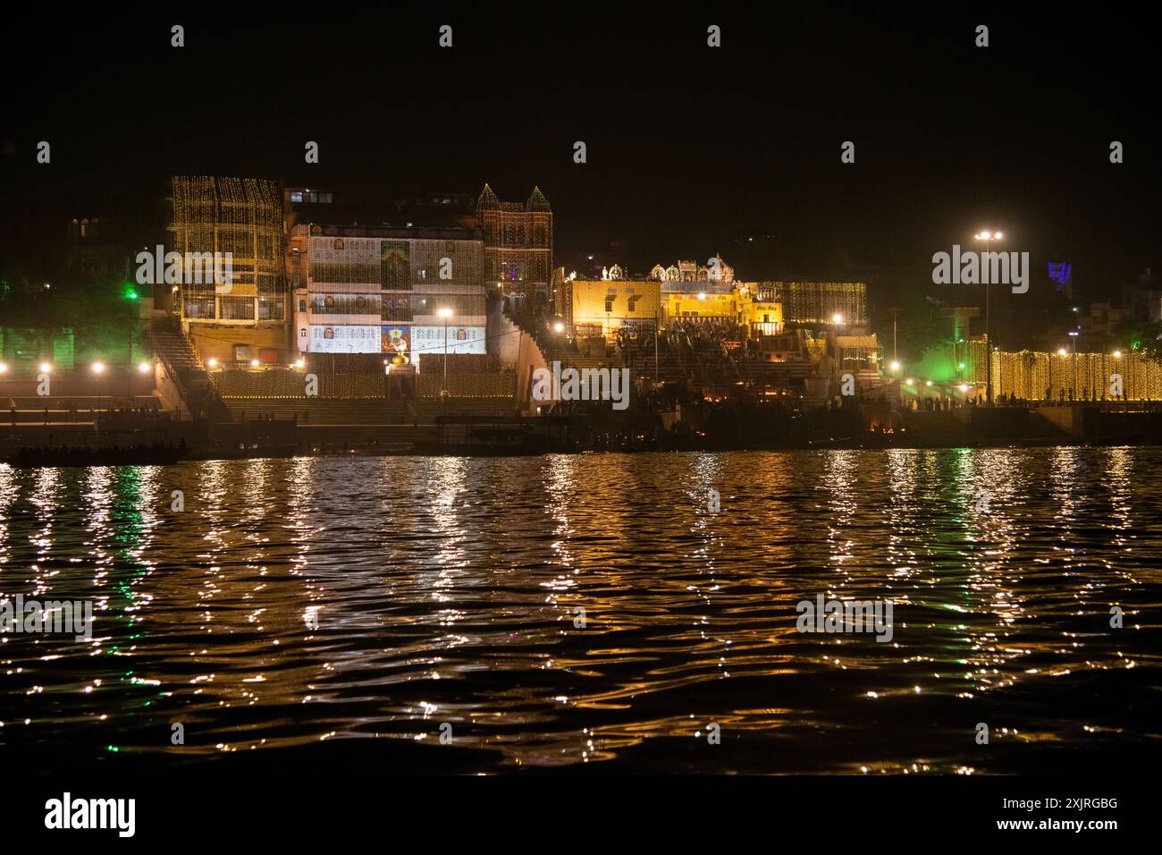 Varanasi ghat night light reflection hi-res stock photography and ...