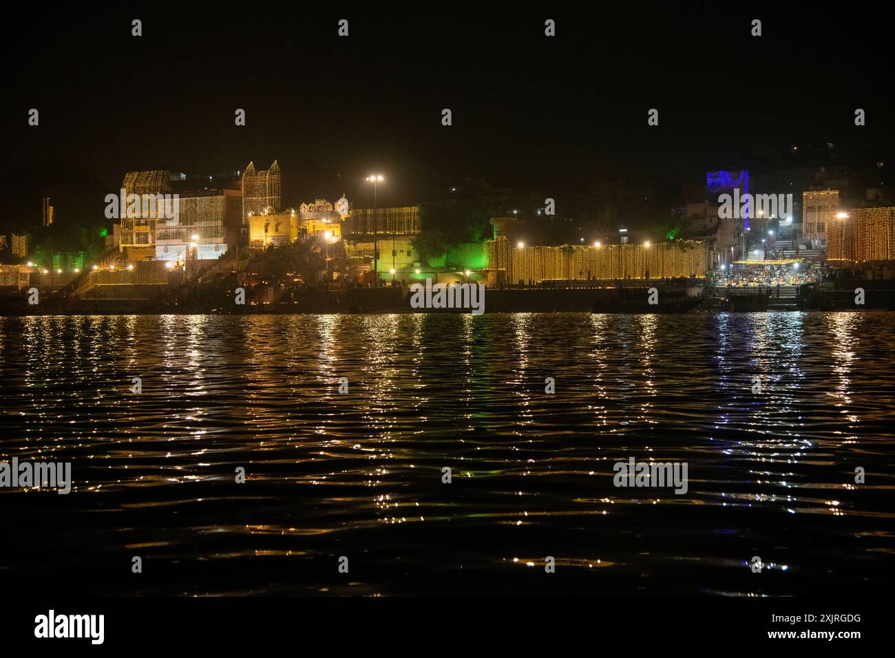Varanasi ghat night light reflection hi-res stock photography and ...