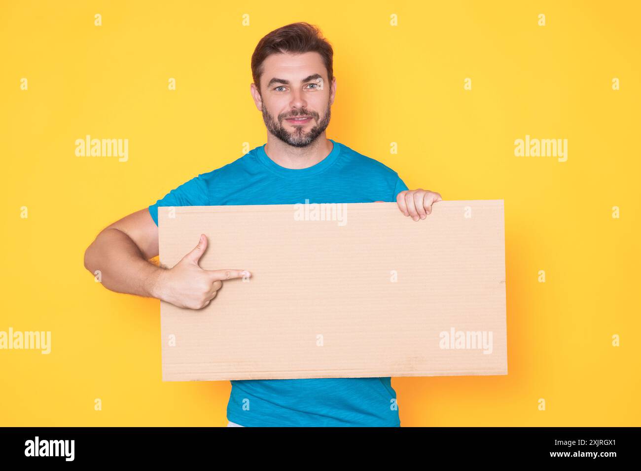Man holds sign, blank card. Placard ready for your product. Man showing ...