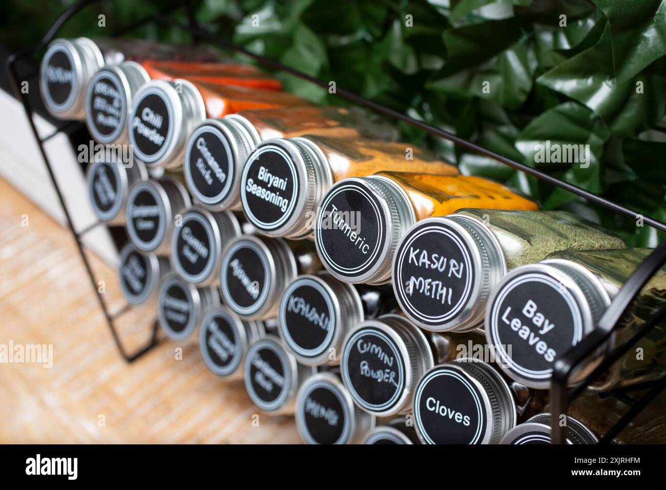A view of a common labeled Indian spices on a rack Stock Photo - Alamy