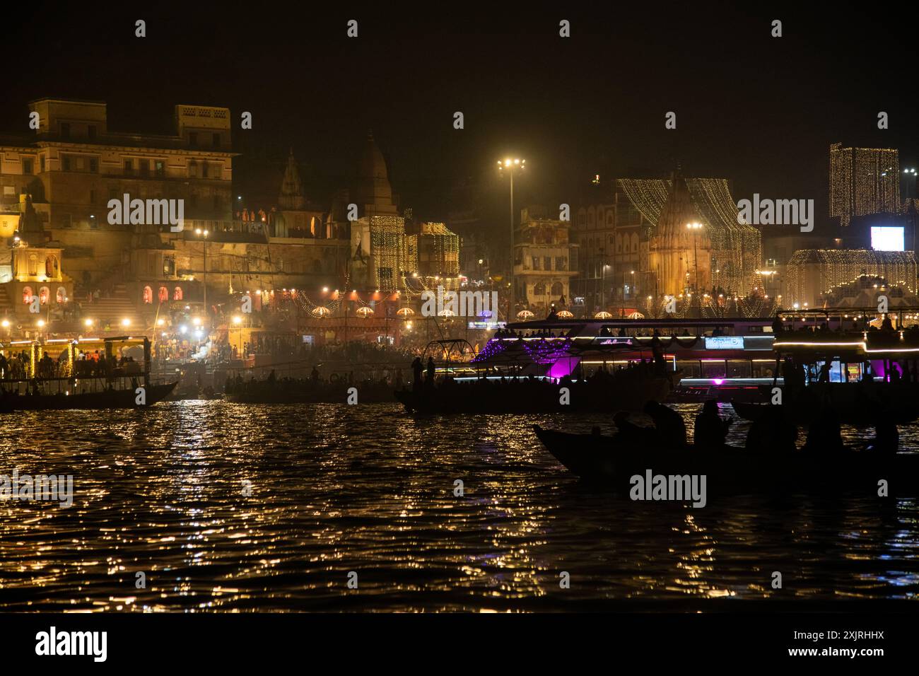 Varanasi ghat night light reflection hi-res stock photography and ...