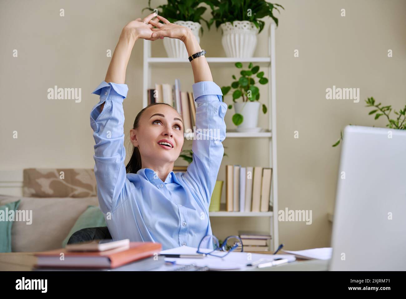 Relaxed employee hi-res stock photography and images - Alamy
