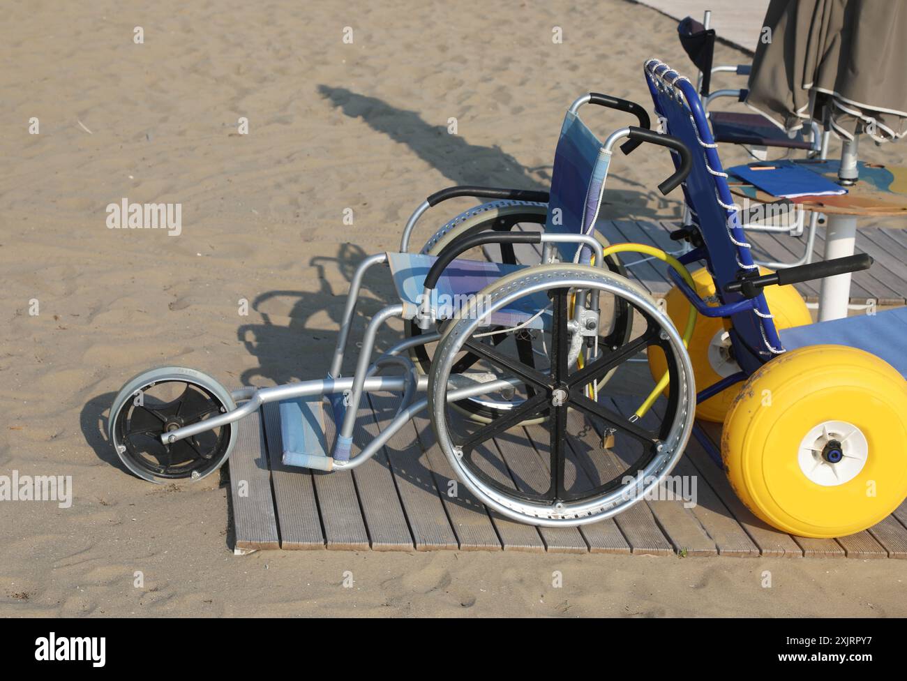 Special wheelchair with large steel wheels for transporting disabled ...