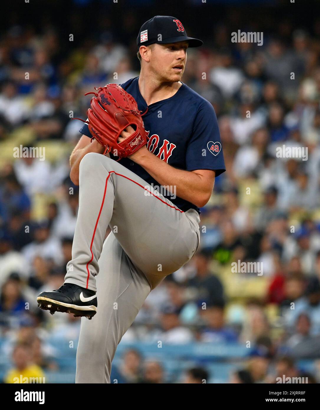 Boston Red Sox staring pitcher Nick Pivetta winds up to deliver agains ...