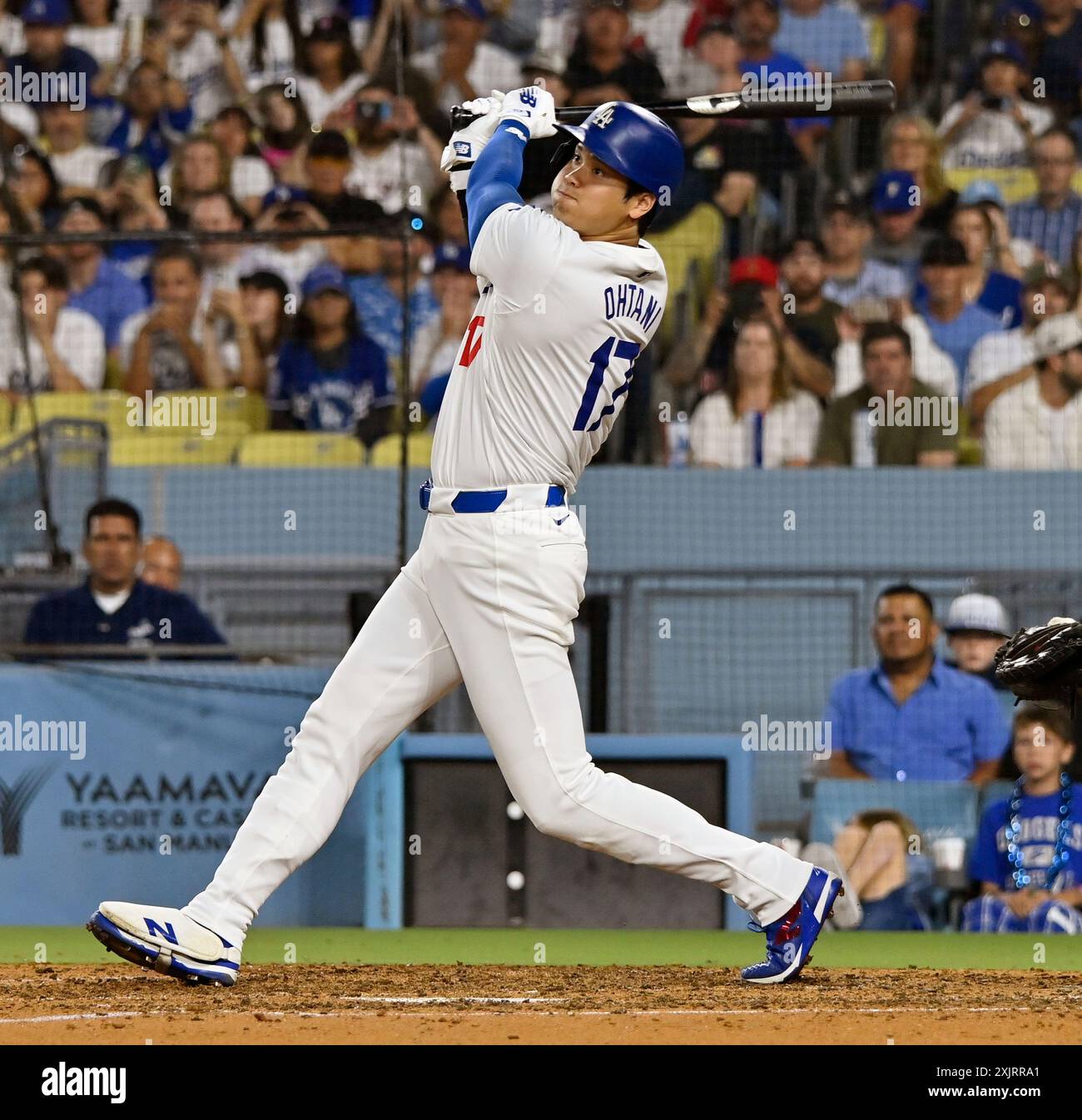 Los Angeles Dodgers Shohei Ohtani hits a double in the eighth inning of ...