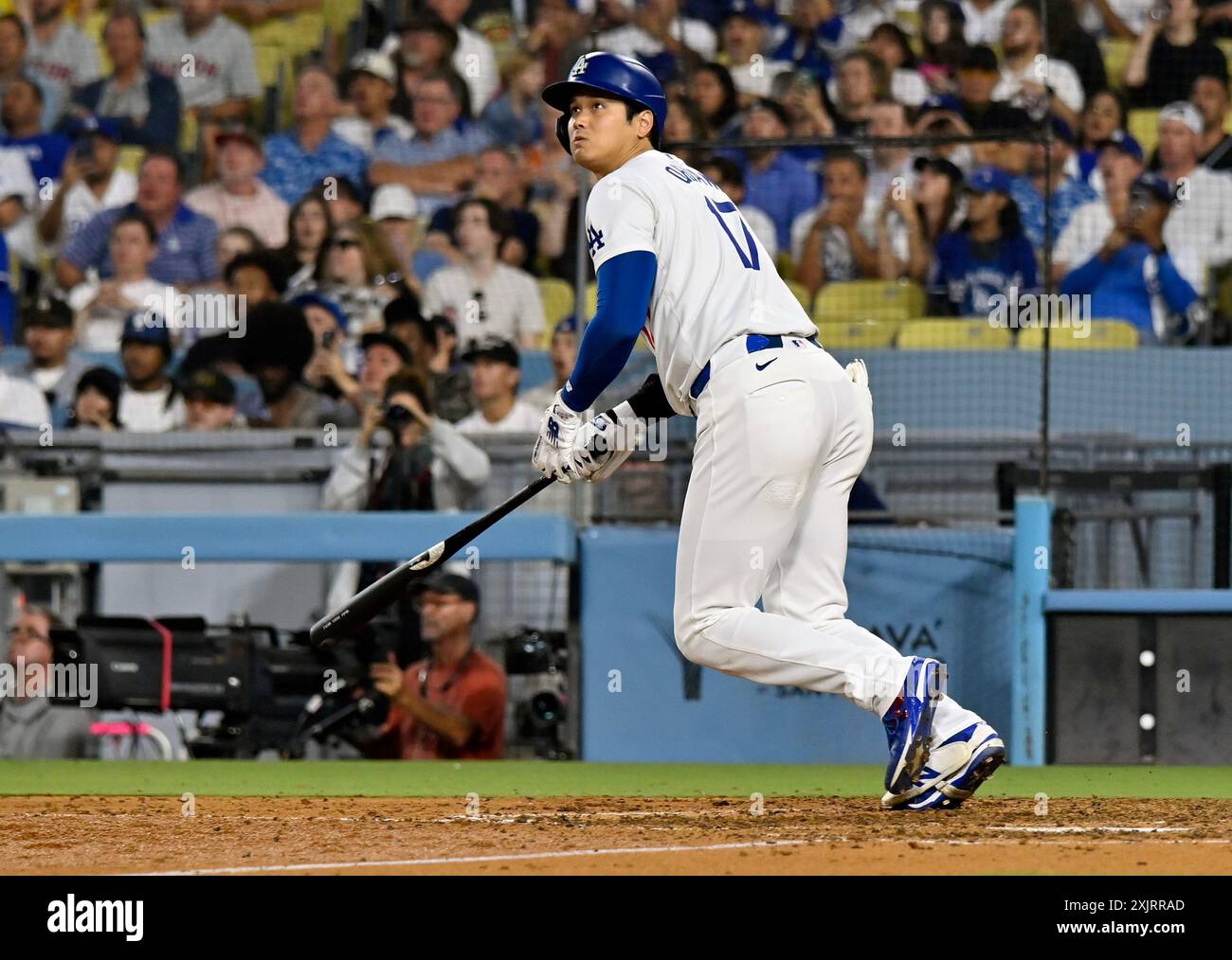 Los Angeles Dodgers Shohei Ohtani hits a double in the eighth inning of ...
