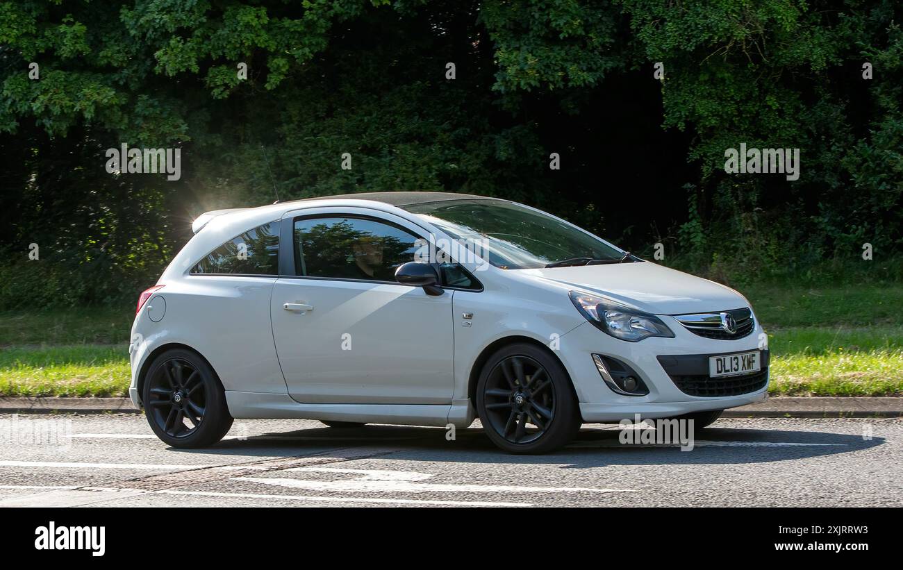 Milton Keynes,UK - July 18th 2024: 2013 white Vauxhall Corsa hatchback ...