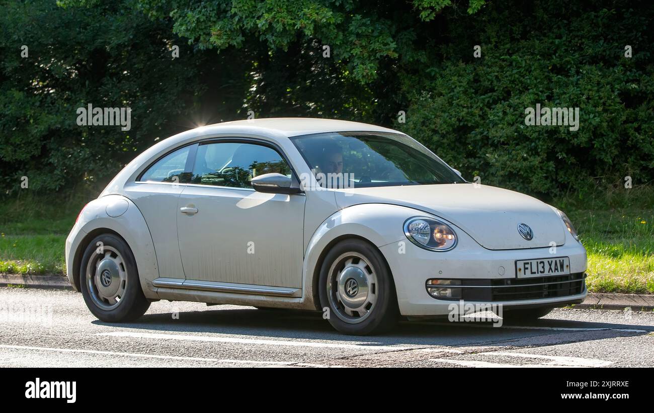 Milton Keynes,UK - July 18th 2024: 2013 white Volkswagen Beetle car ...