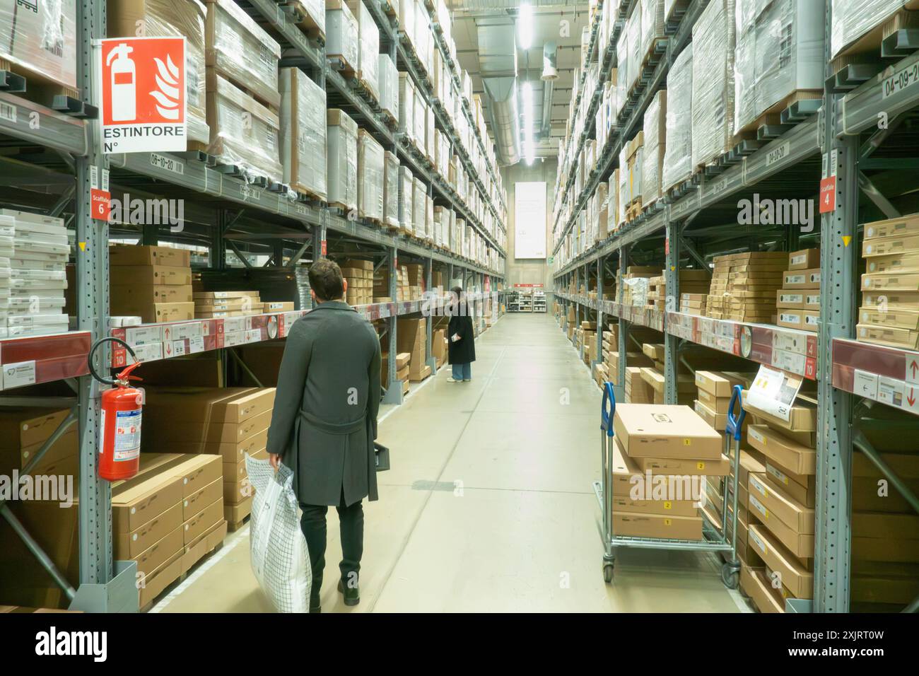Warehouse aisle in an IKEA store. Founded in 1943, IKEA is the world's ...