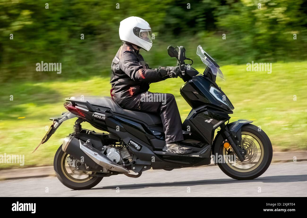 Milton Keynes,UK - July 18th 2024: Man riding a 2023 Lexmoto TR 125 t-5 ...