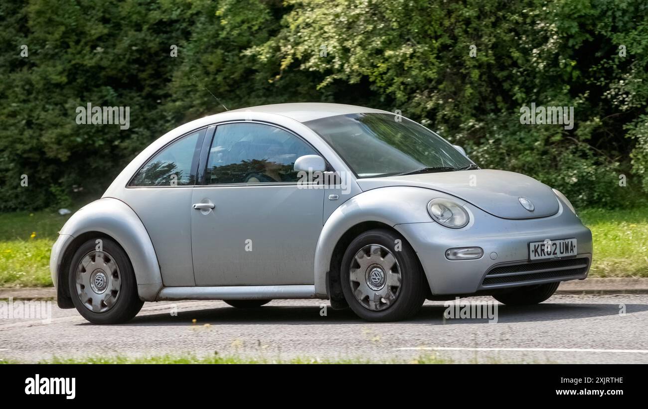 Milton Keynes,UK - July 18th 2024: 2002 Volkswagen Beetle car driving ...