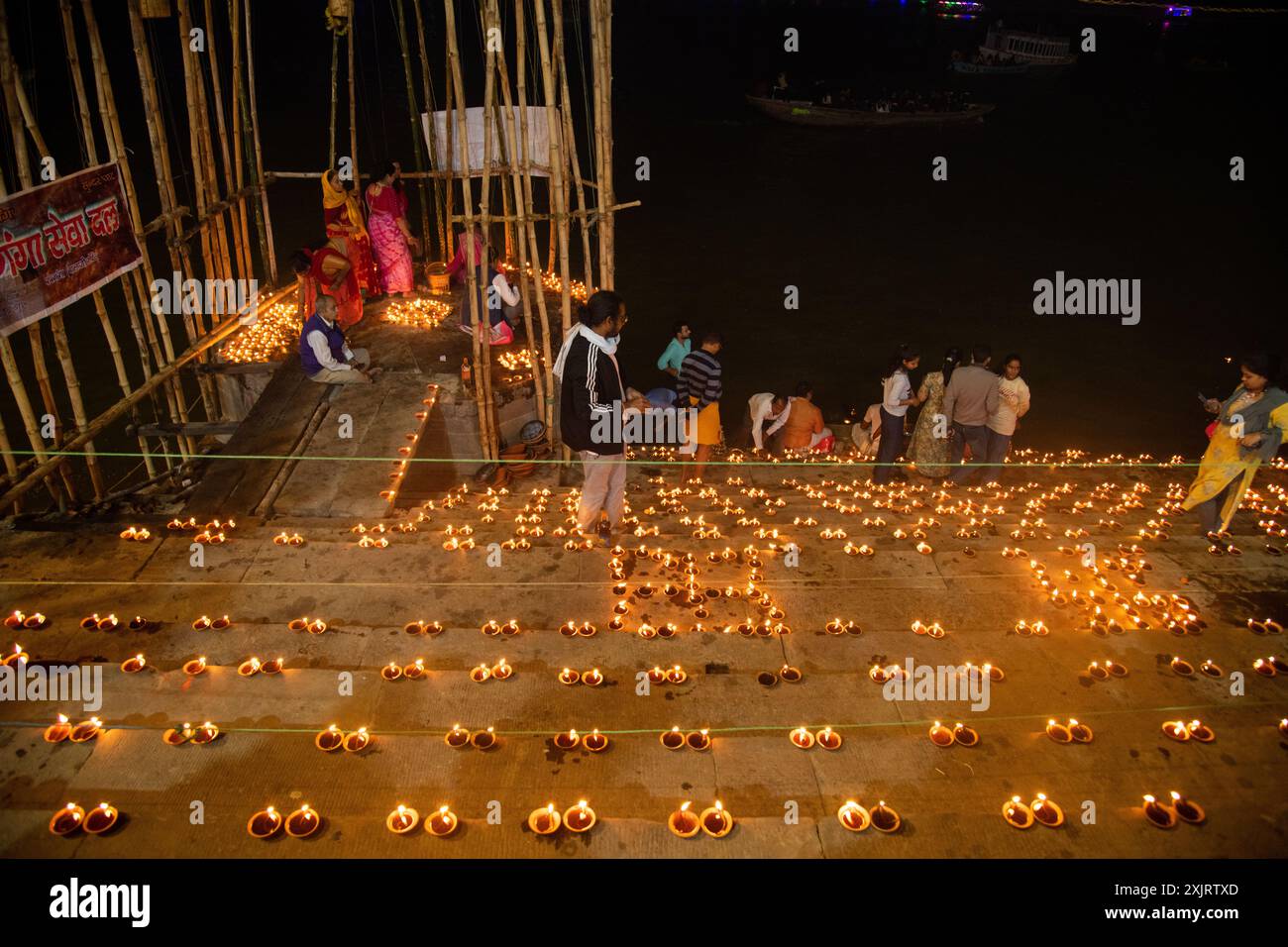 Hindu devotees light earthen lamps hi-res stock photography and images ...
