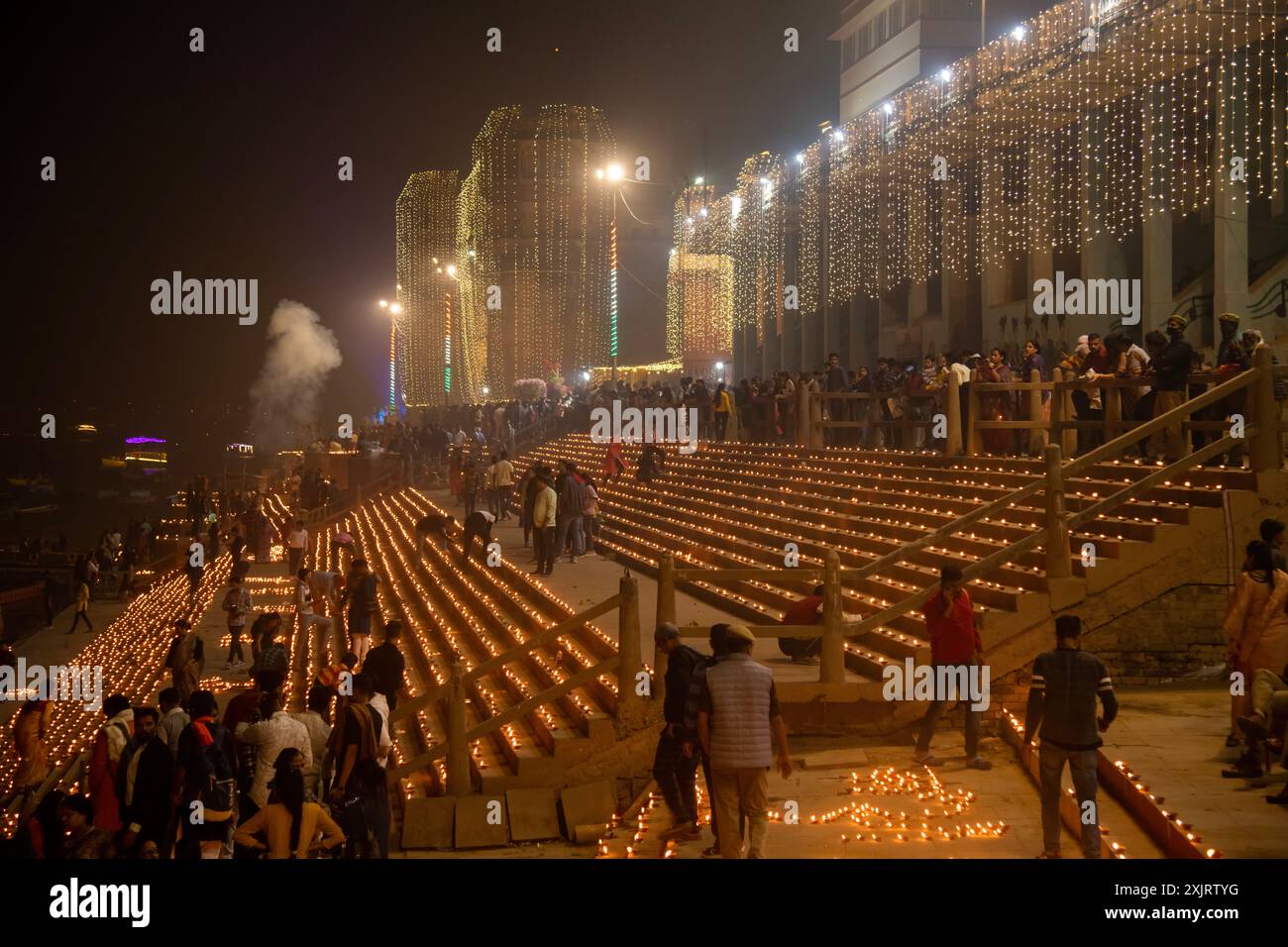 Devotees light earthen oil lamps on the occasion of Dev Diwali at ...