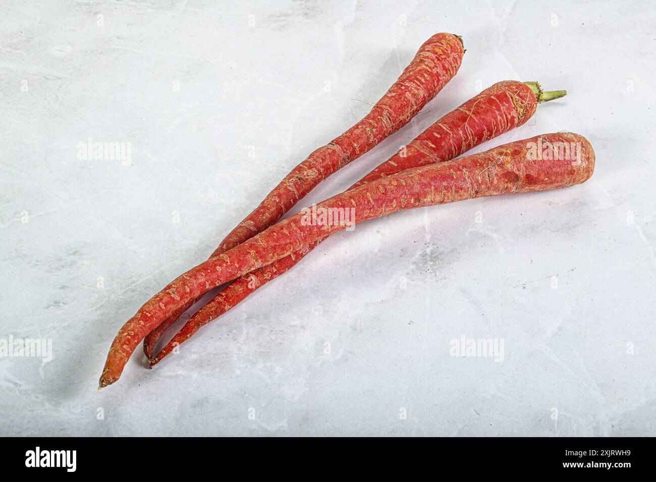 Raw ripe Indian red carrot root Stock Photo - Alamy
