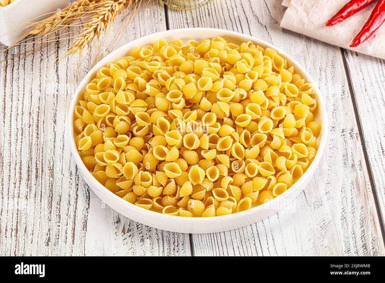 Italian cuisine - dry conchiglie shell pasta Stock Photo - Alamy