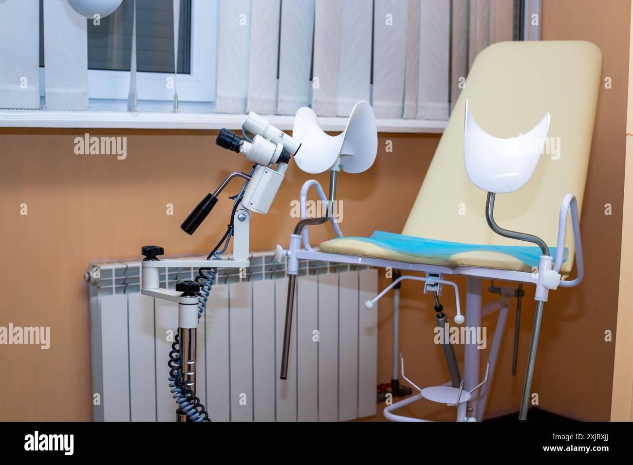 colposcope in gynecologist office. gynecological chair in hospital ...