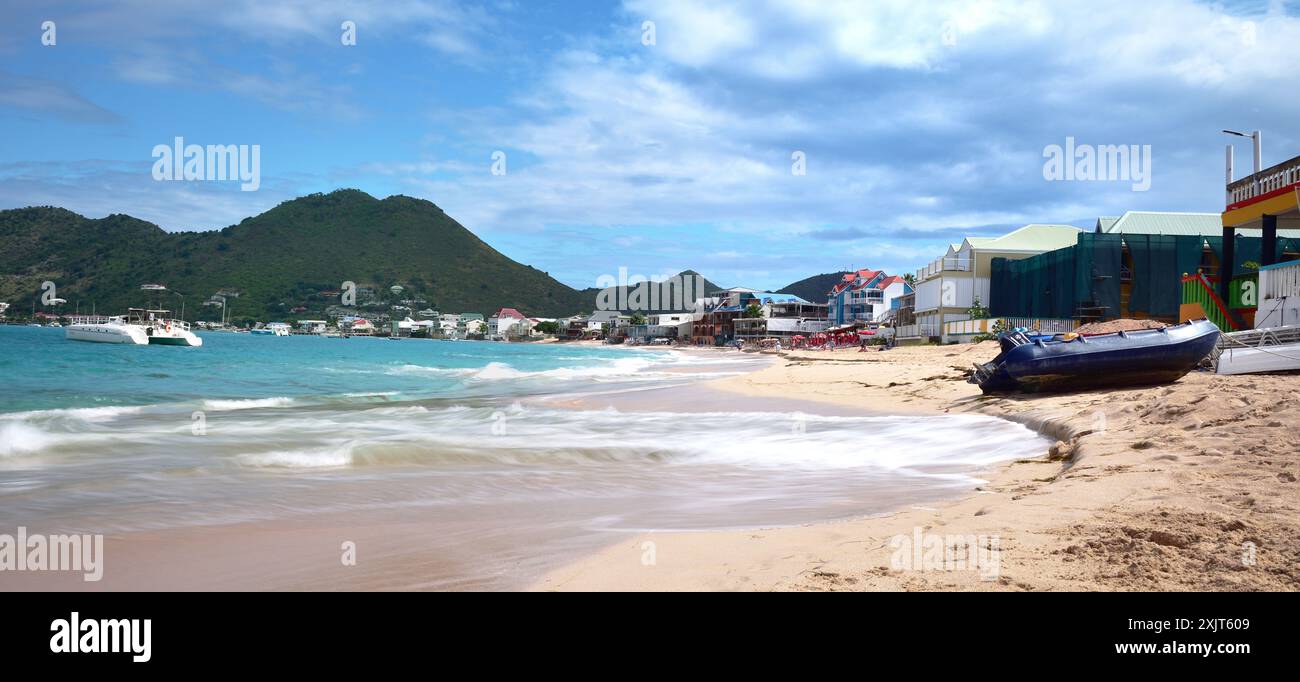 Orient Bay, St Maarten - 2nd February 2024:The curved sea front of ...
