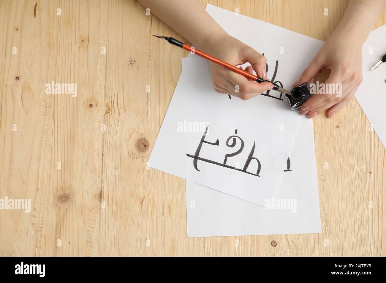Calligraphy. Woman with brush writing words Reading and Read in Hindi ...