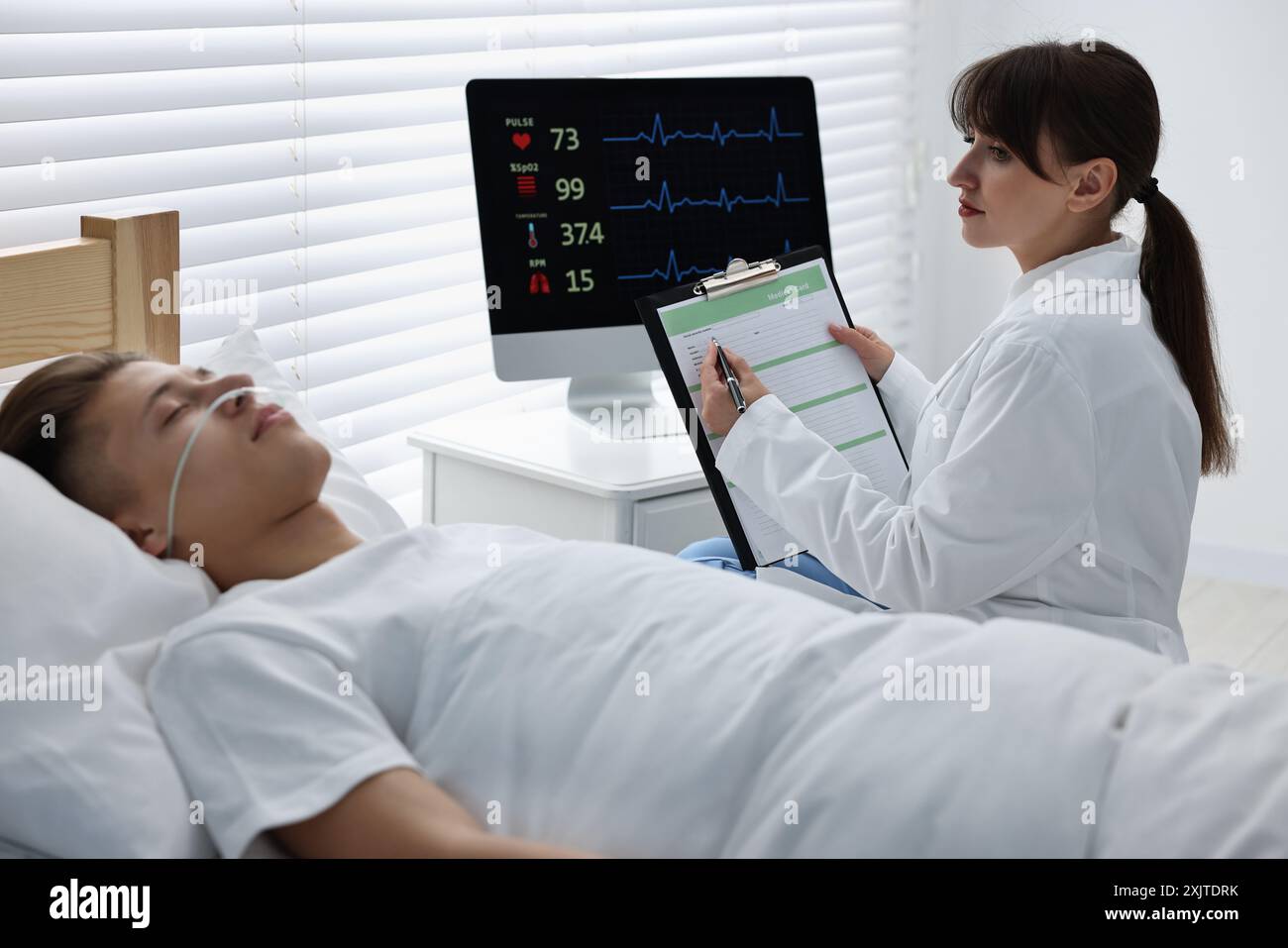Young female patient in coma hi-res stock photography and images - Alamy