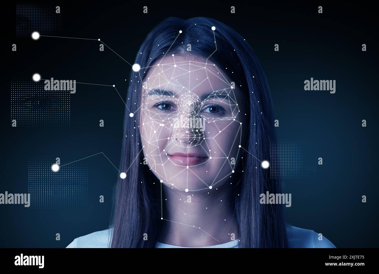 Facial recognition system. Scanning woman's face for authentication ...
