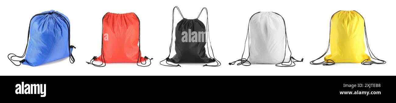 Many filled drawstring bags of different colors isolated on white, set ...