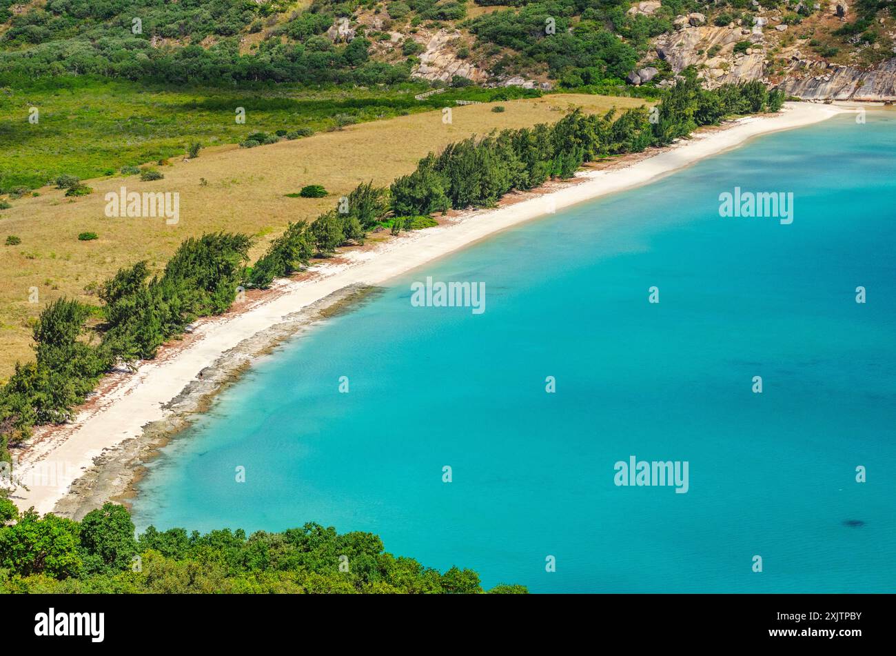 Picturesque aerial view on tropical sandy Watsons Beach with turquoise ...