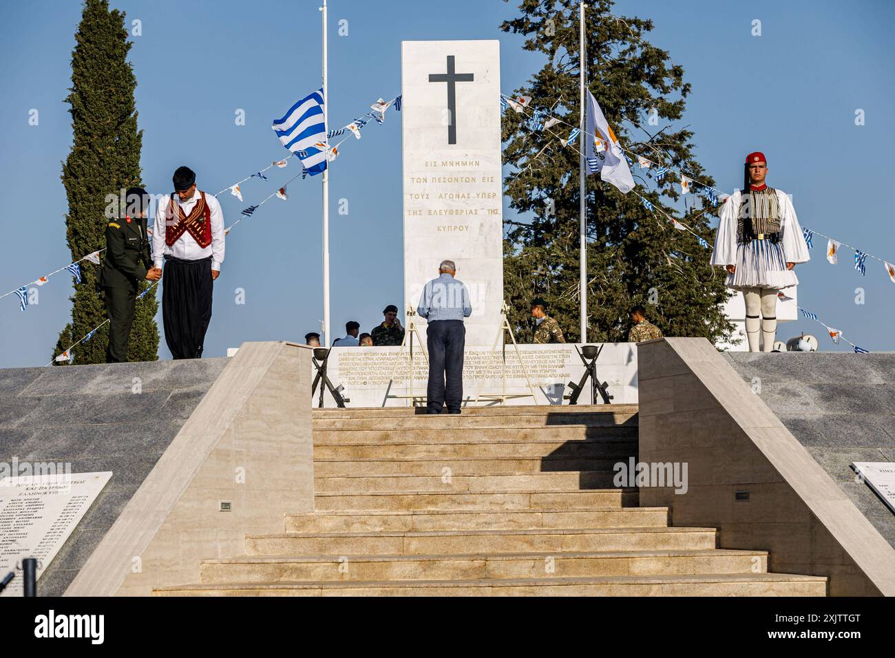 Cyprus : 50th invasion anniversary memorial A man is seen in front of ...