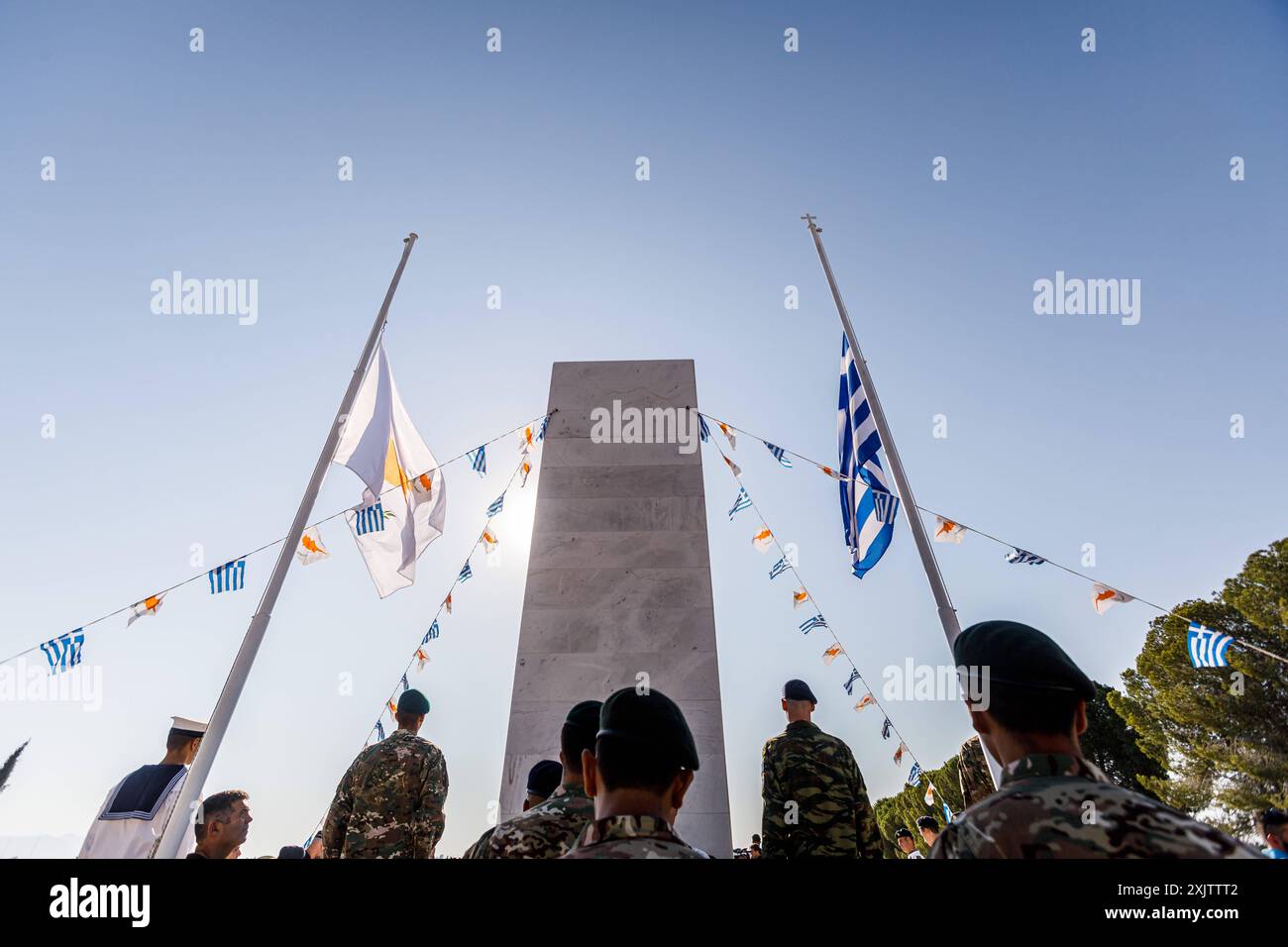 Cyprus : 50th invasion anniversary memorial Soldiers are seen behind ...