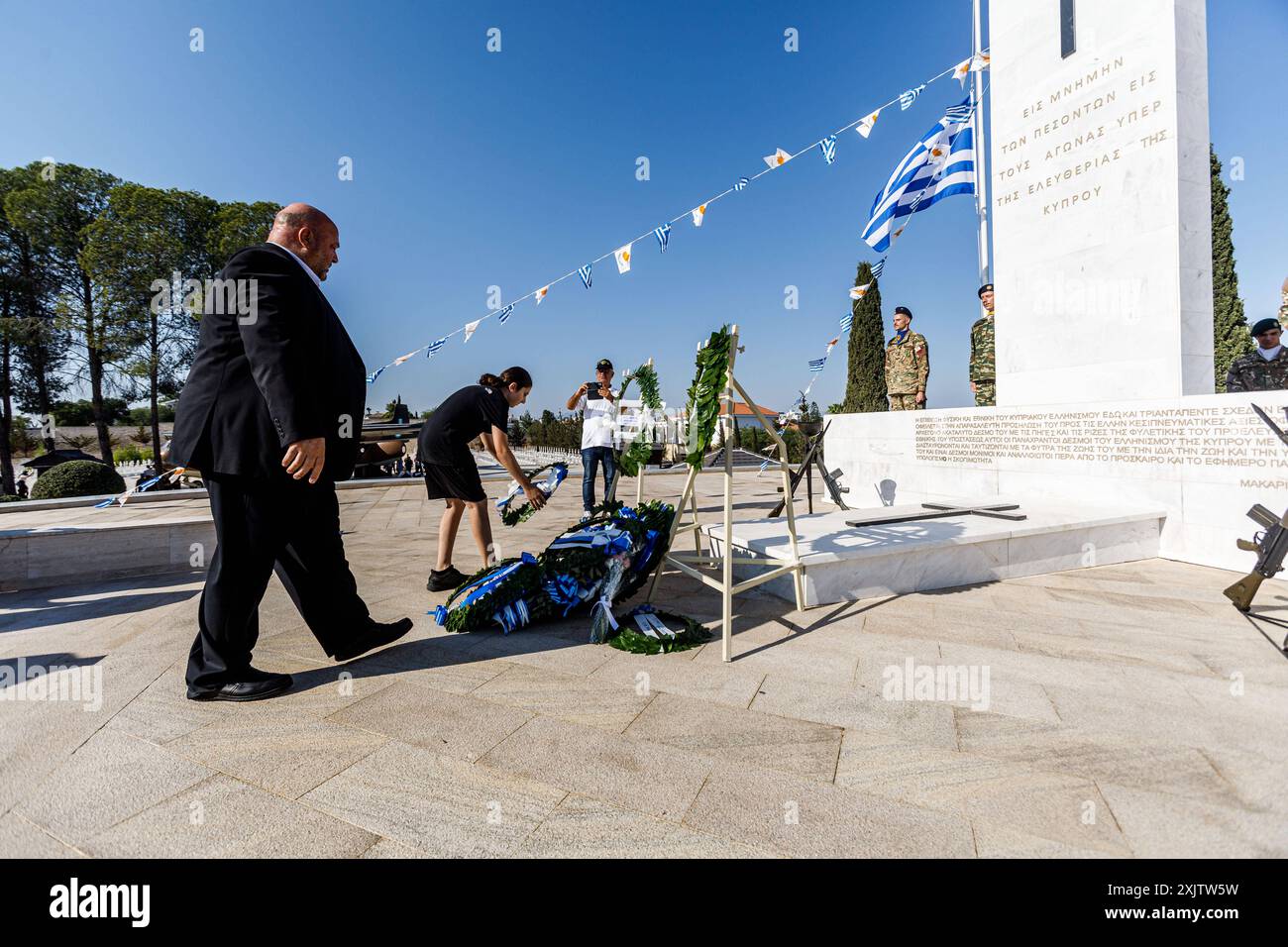 Cyprus : 50th invasion anniversary memorial People are putting wreaths ...