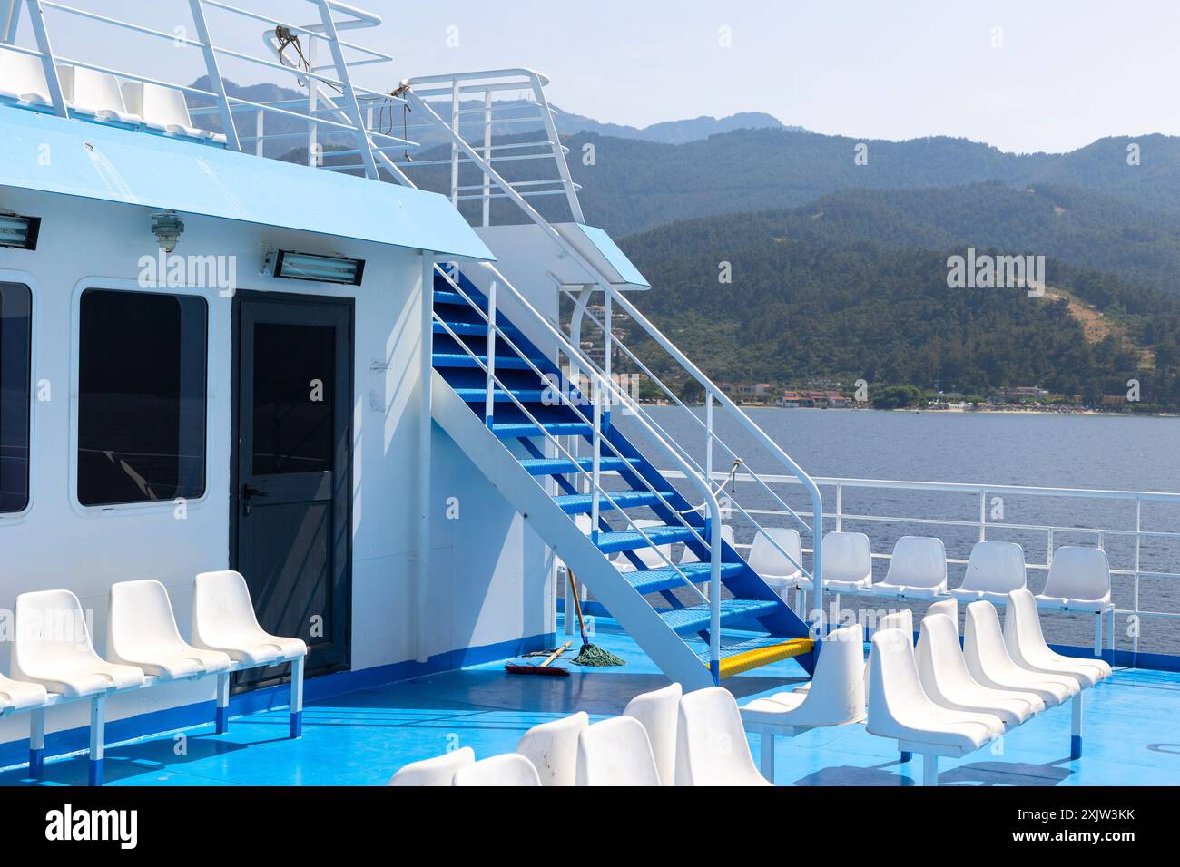 empty white seats and staircase on ferry boat terrace, port Stock Photo ...
