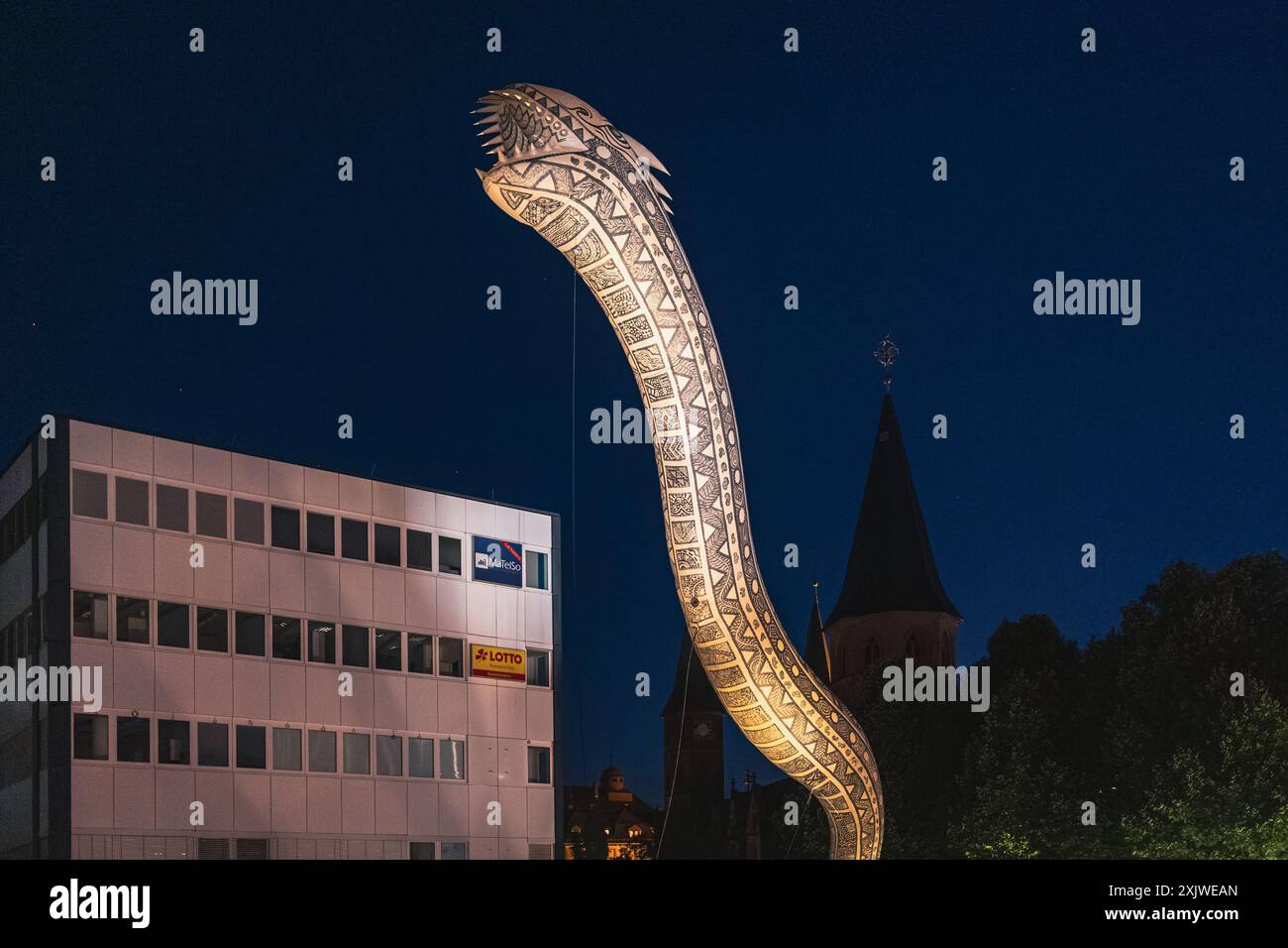 Kaiserslautern, Germany. 19th July, 2024. Gigantic moray eel in the sky ...